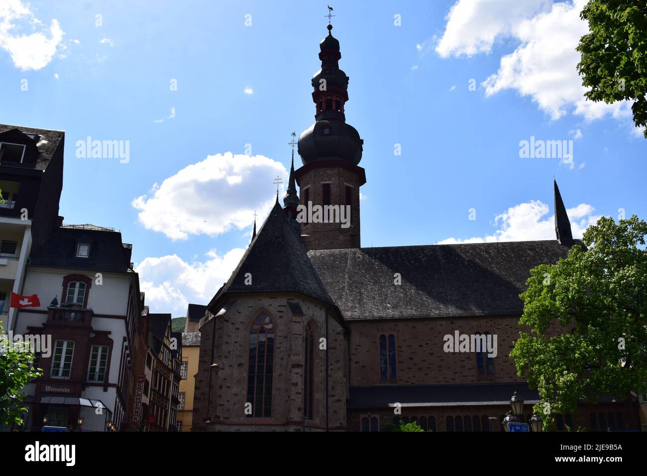 old town waterfront side with the church tower Stock Photo - Alamy
