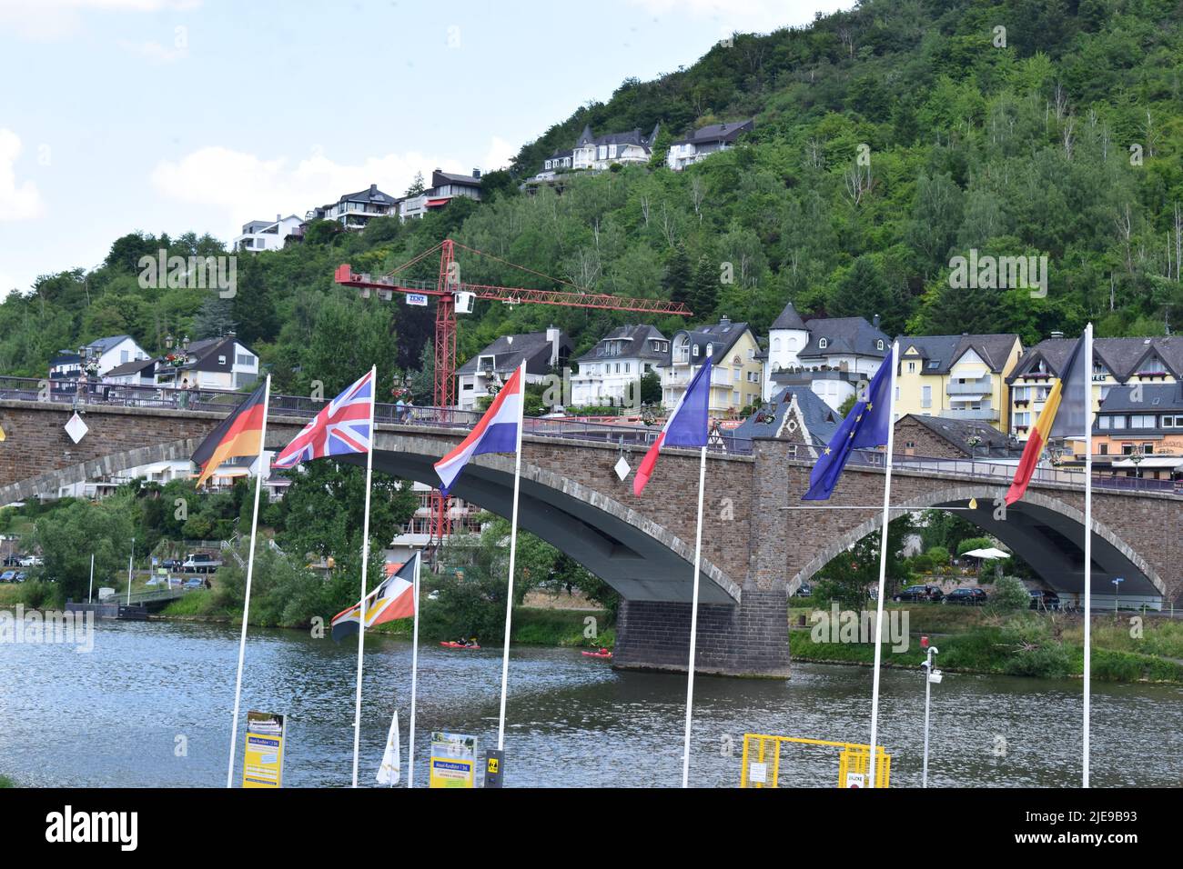 flags in front of the Mosel bridge Stock Photo - Alamy
