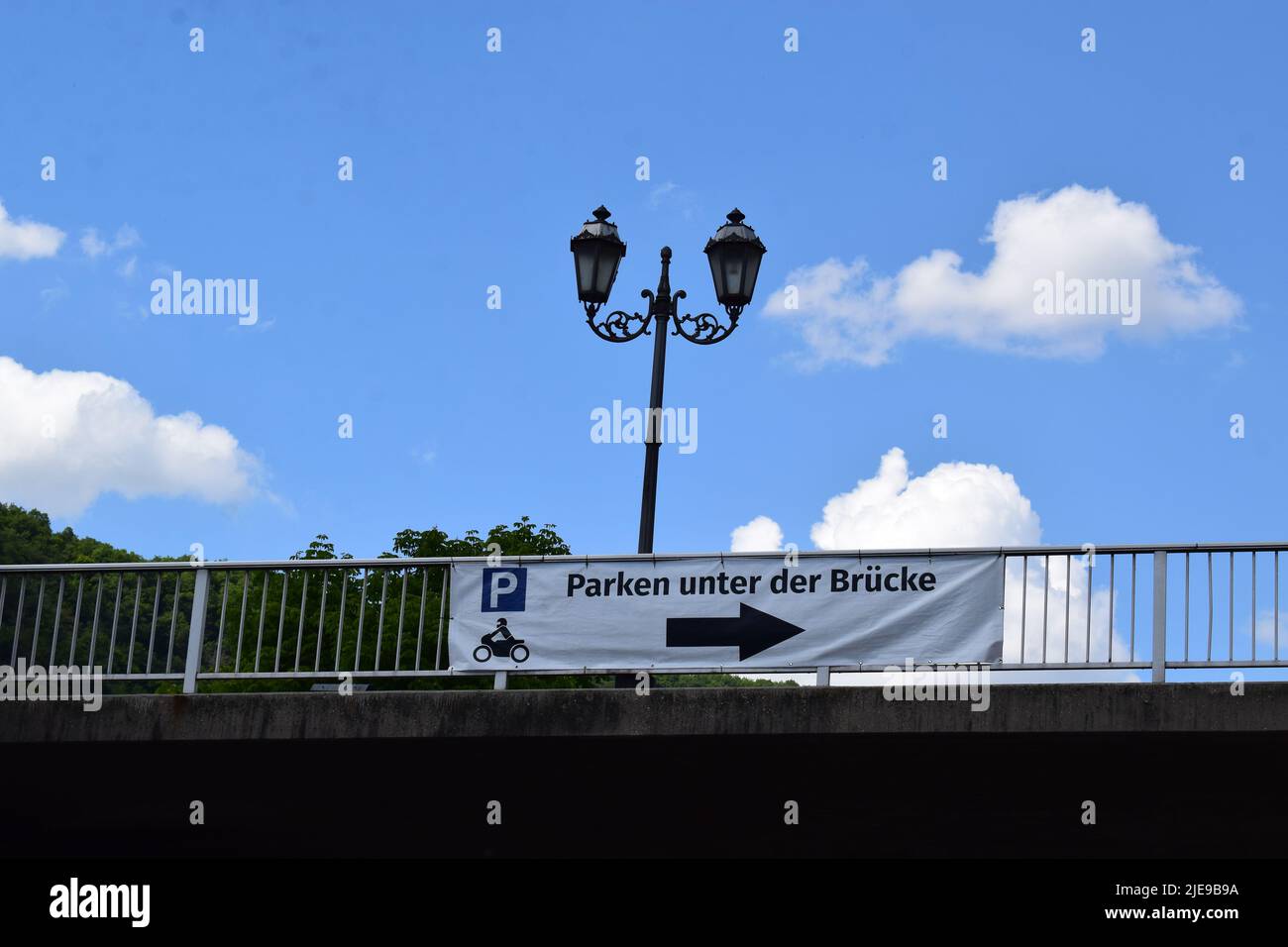 parking under the bridge sign Stock Photo - Alamy
