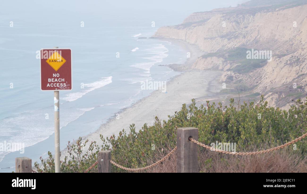 Steep unstable cliff, rock or bluff, foggy weather, California coast ...