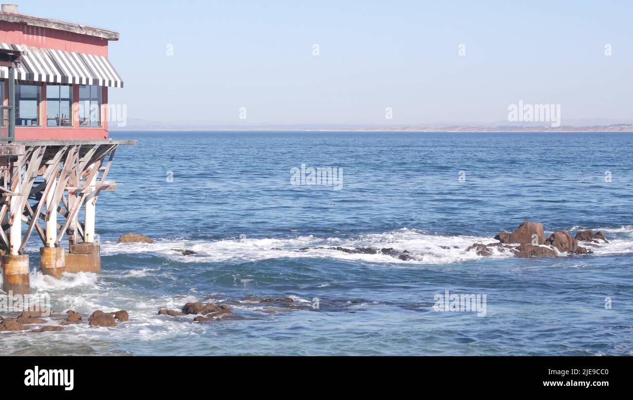 Waterfront beachfront cafe on piles, pillars or pylons, Monterey beach ...