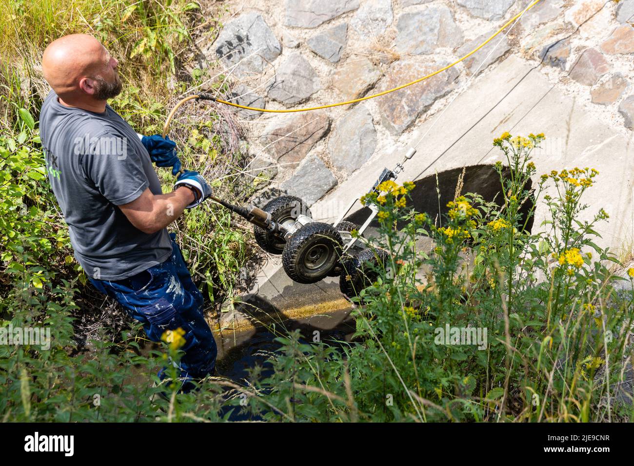 Oldenburg, Germany. 26th June, 2022. Marc Meyerholz prepares a robot ...