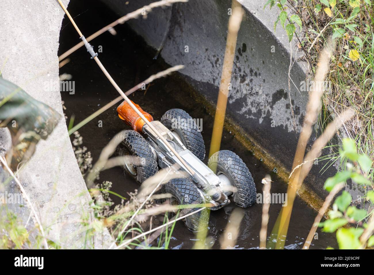 Oldenburg, Germany. 26th June, 2022. A robot equipped with a camera is ...