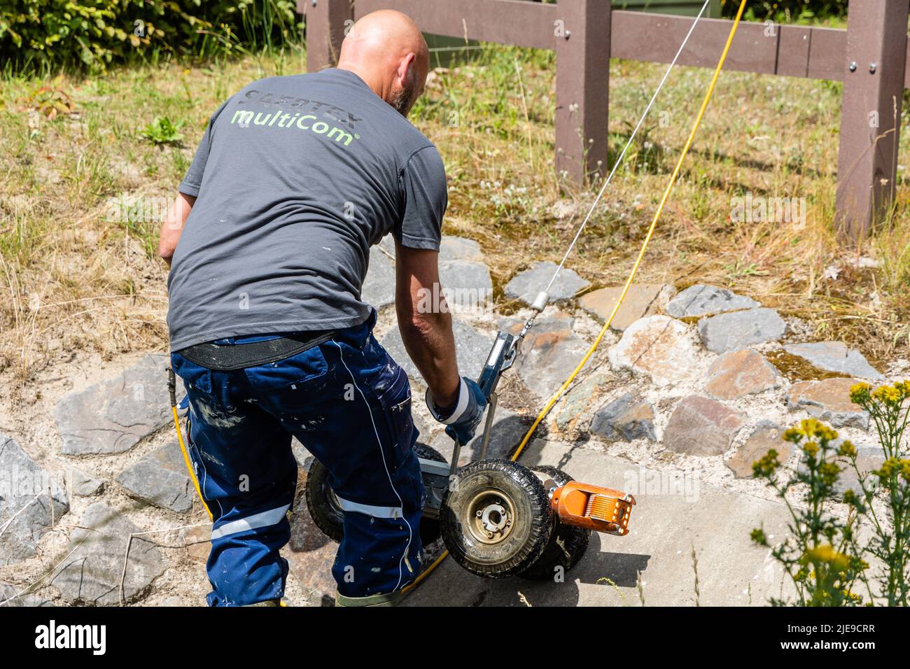 Oldenburg, Germany. 26th June, 2022. Marc Meyerholz prepares a robot ...