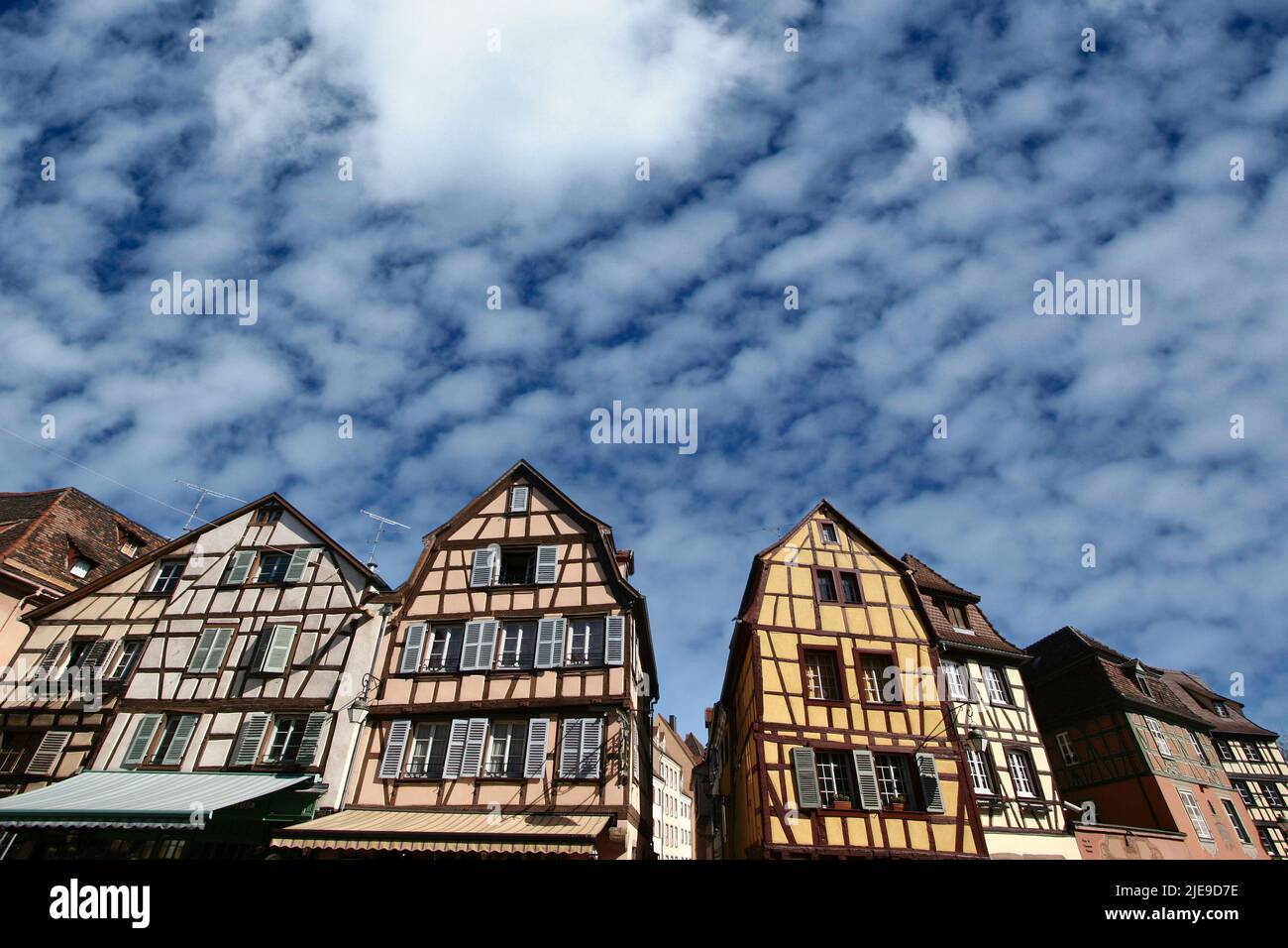 in the street of a alsacian villlage in the summer in the street of a ...