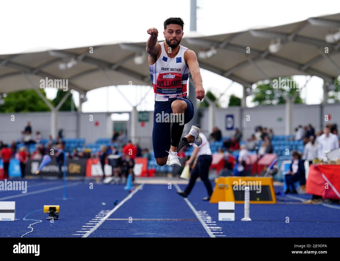 Benjamin Williams on his way to winning the MenÕs Triple Jump during ...
