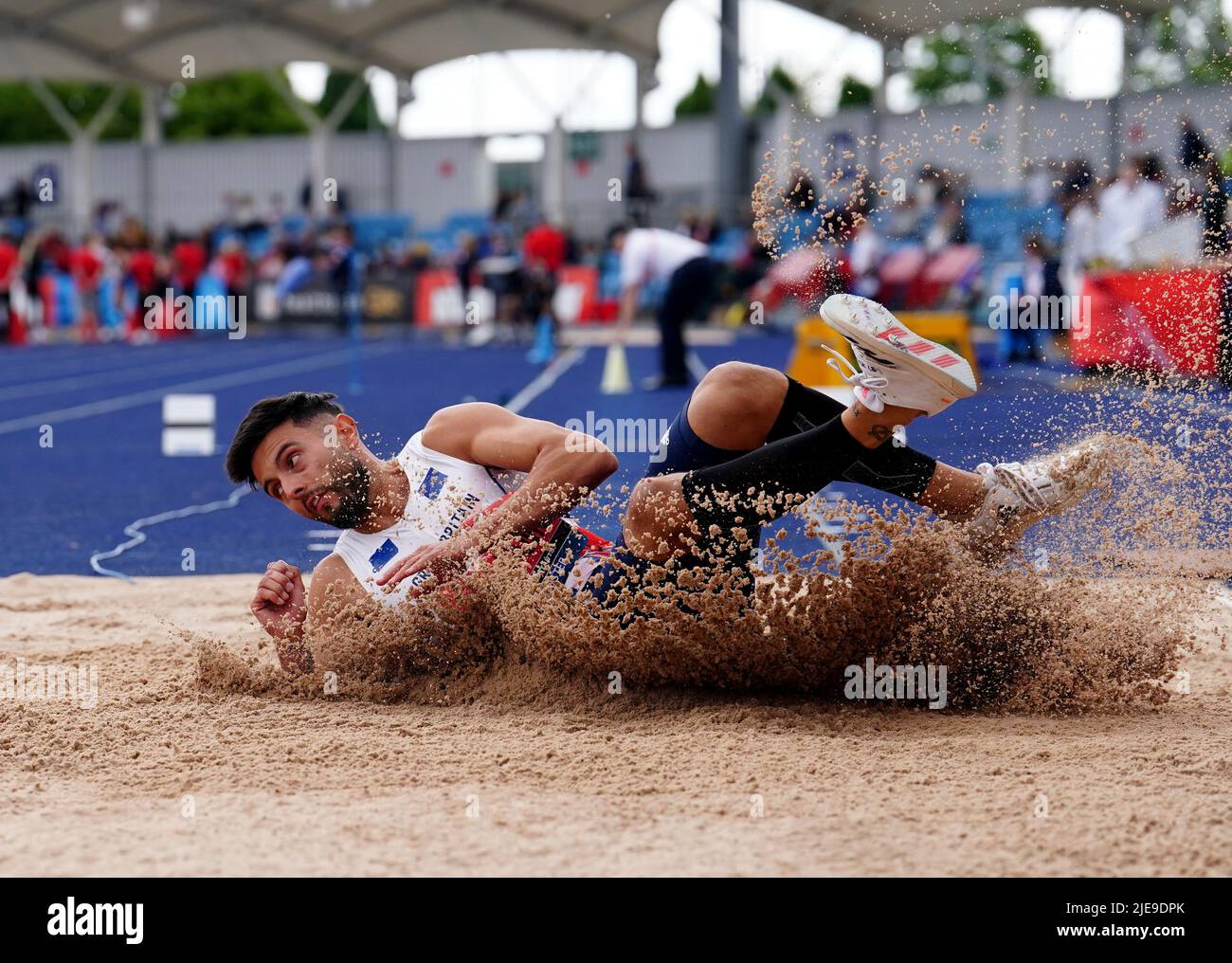 Benjamin Williams on his way to winning the MenÕs Triple Jump during ...