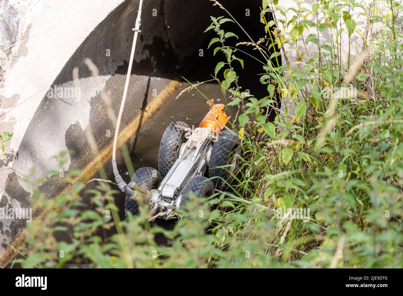Oldenburg, Germany. 26th June, 2022. A robot equipped with a camera is ...