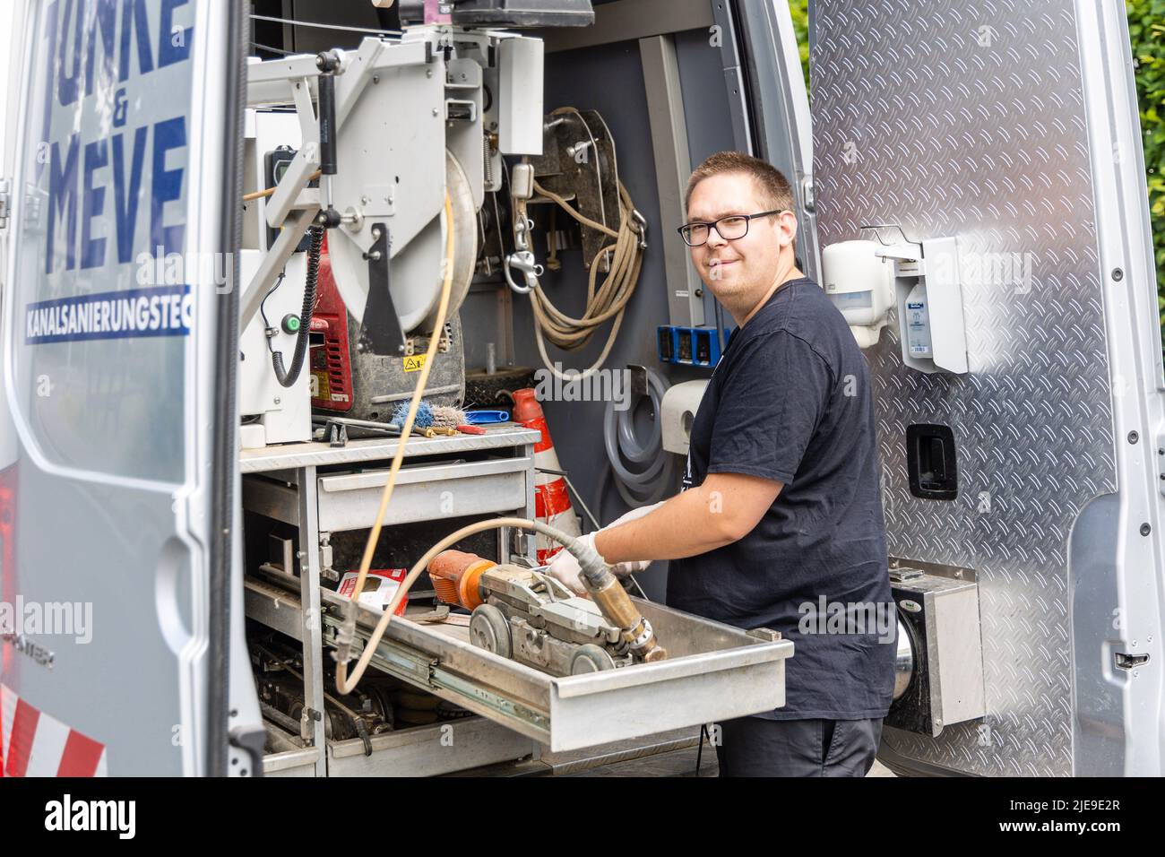 Oldenburg, Germany. 26th June, 2022. Damian Bodde inspects a robot ...
