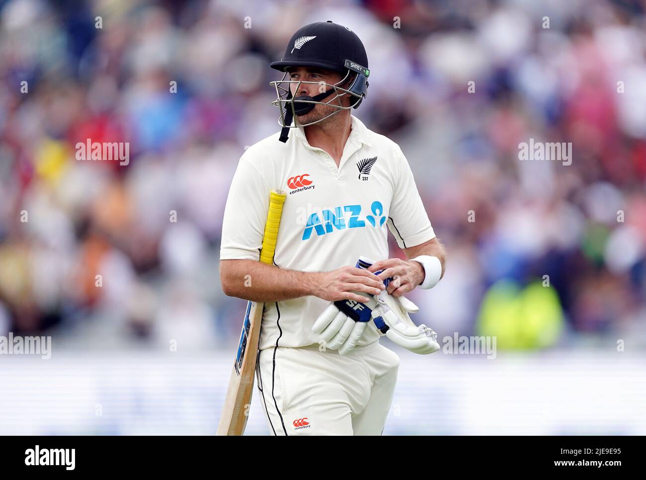 New Zealand's Tim Southee walks off the pitch after losing his wicket ...