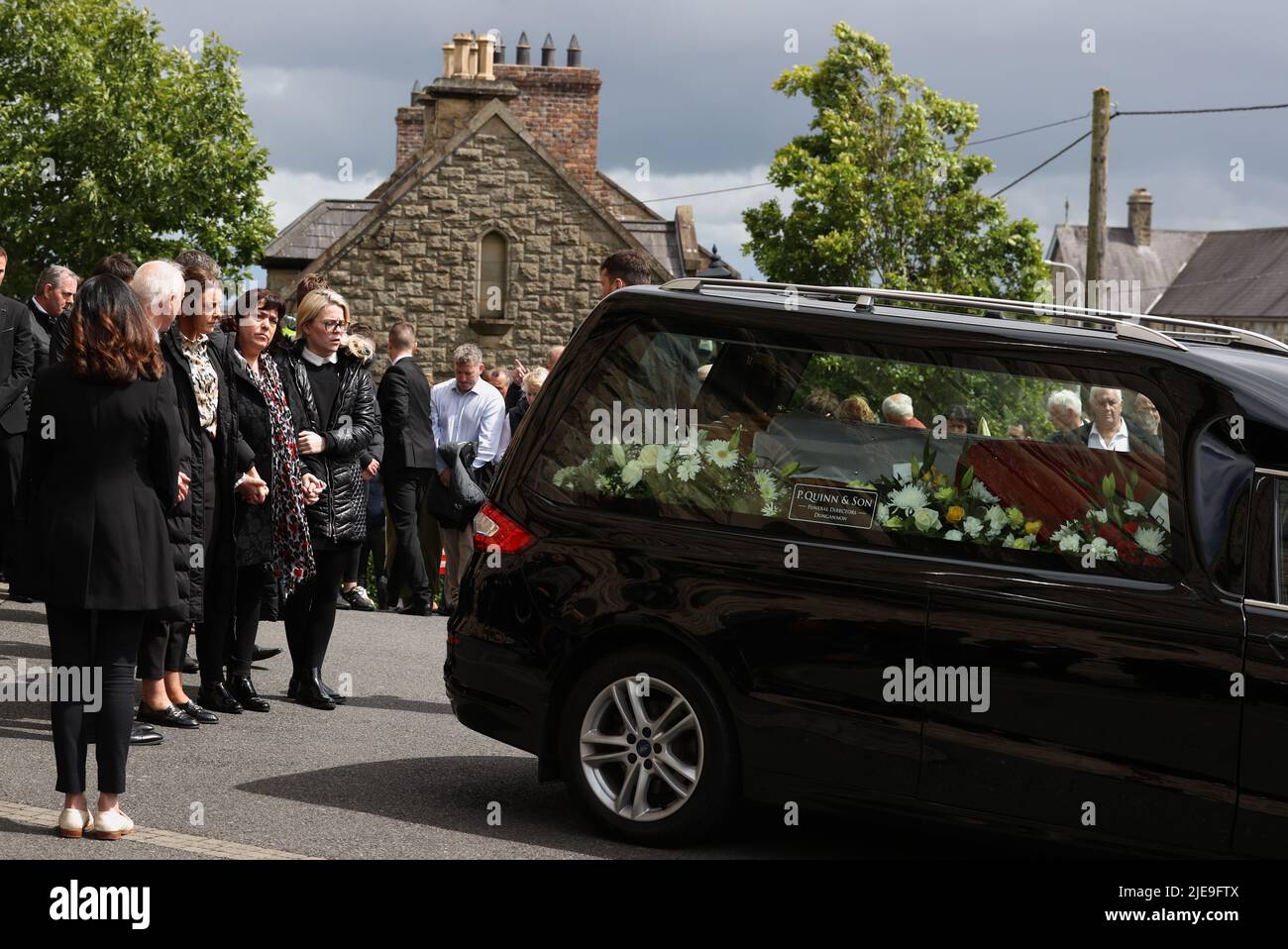 Family members, (left to right) father Sean, sister Louise, mother ...