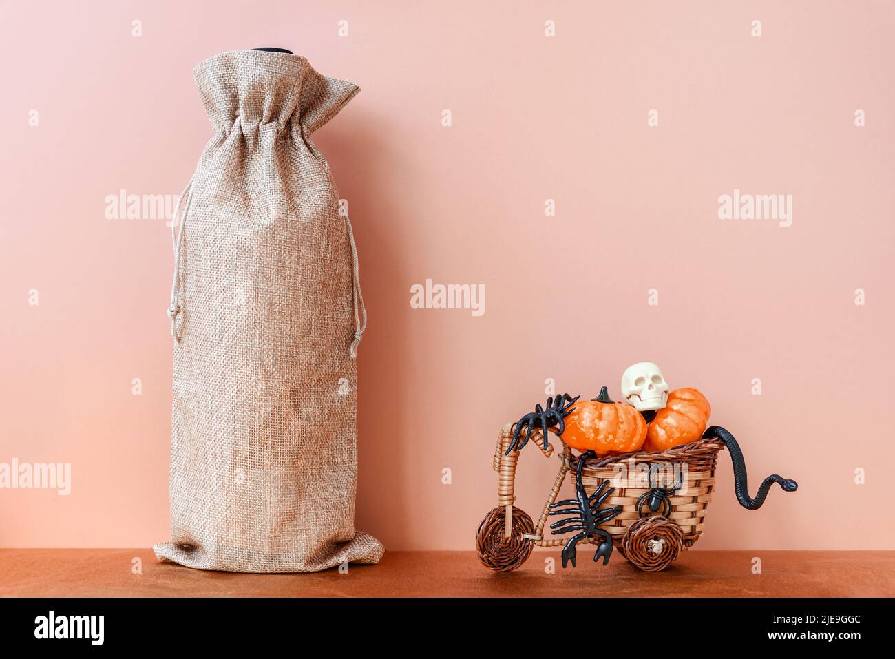 Halloween mockup with wine bag blank with pupkin and spiders. Wine bag ...