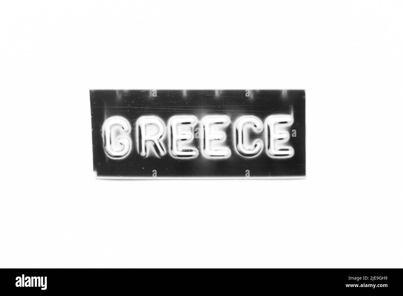 Black color banner that have embossed letter with word greece on white ...