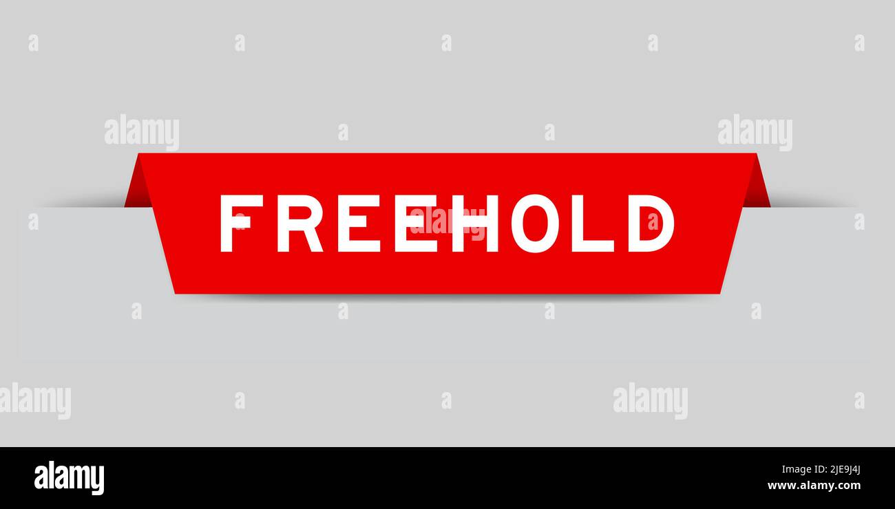 Red color inserted label with word freehold on gray background Stock ...