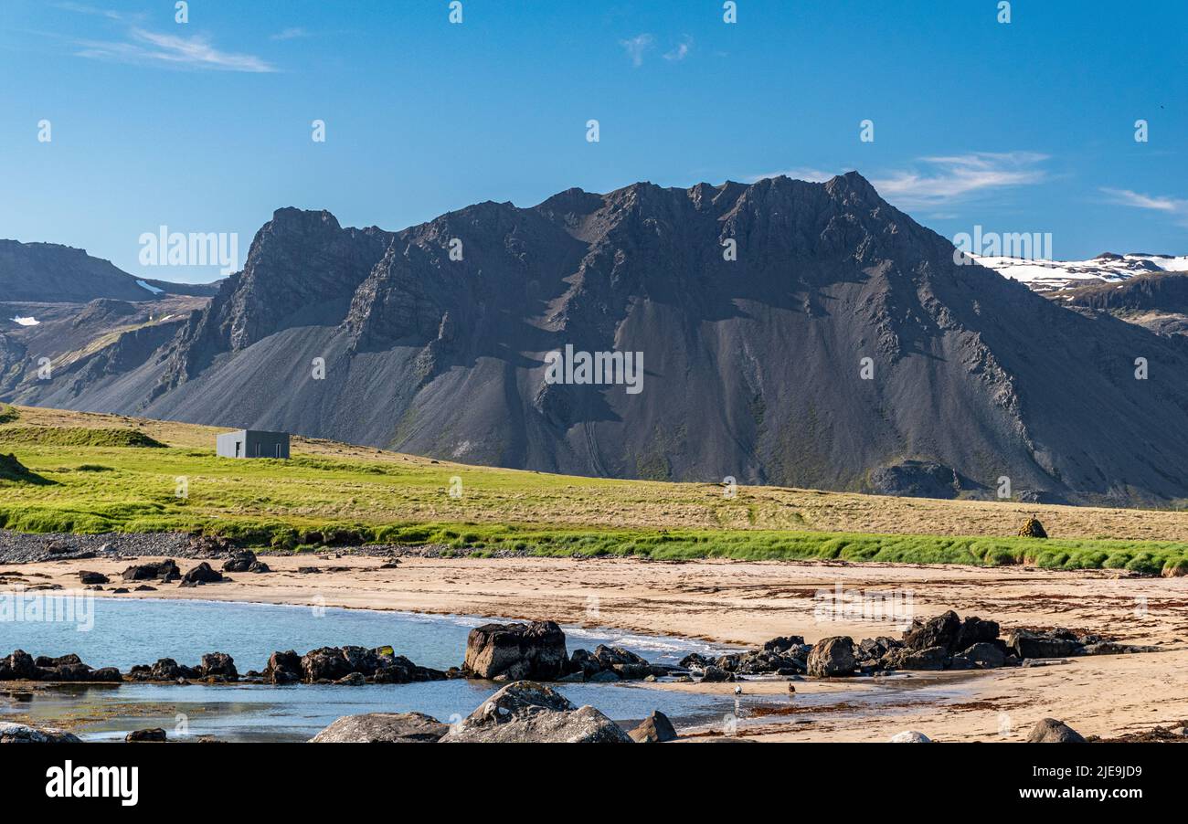 The black Thorgeirsfellshyrna peak seen from the Ytri Tunga beach in ...