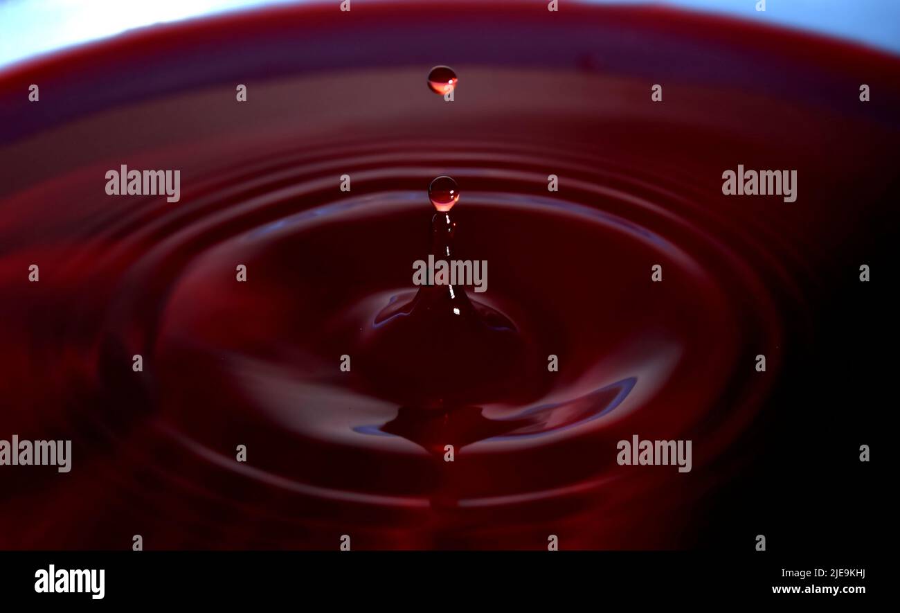 Water Drop Photography: red water drops with spire Stock Photo - Alamy