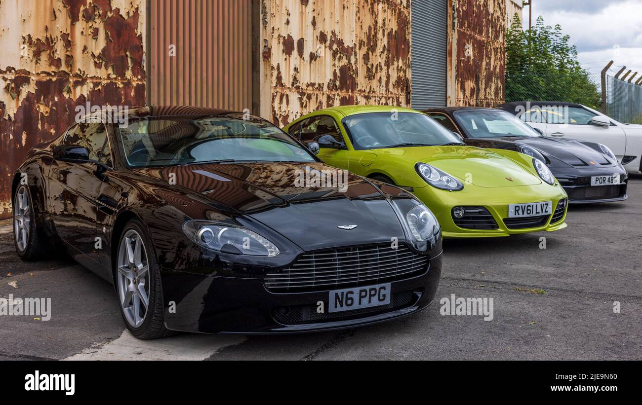 A stunning collection of sports cars including a Aston Martin Vantage ...