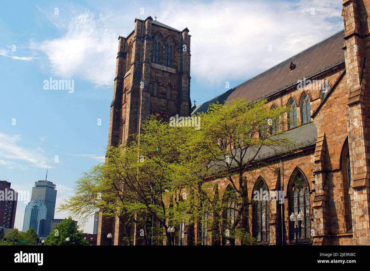 Holy Cross Cathedral appears to dwarf the high Boston skyline Stock ...