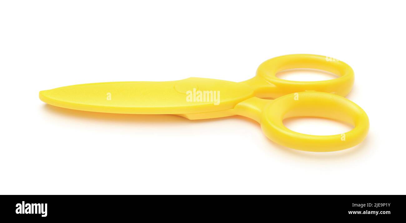 Children's yellow plastic scissors isolated on white Stock Photo - Alamy