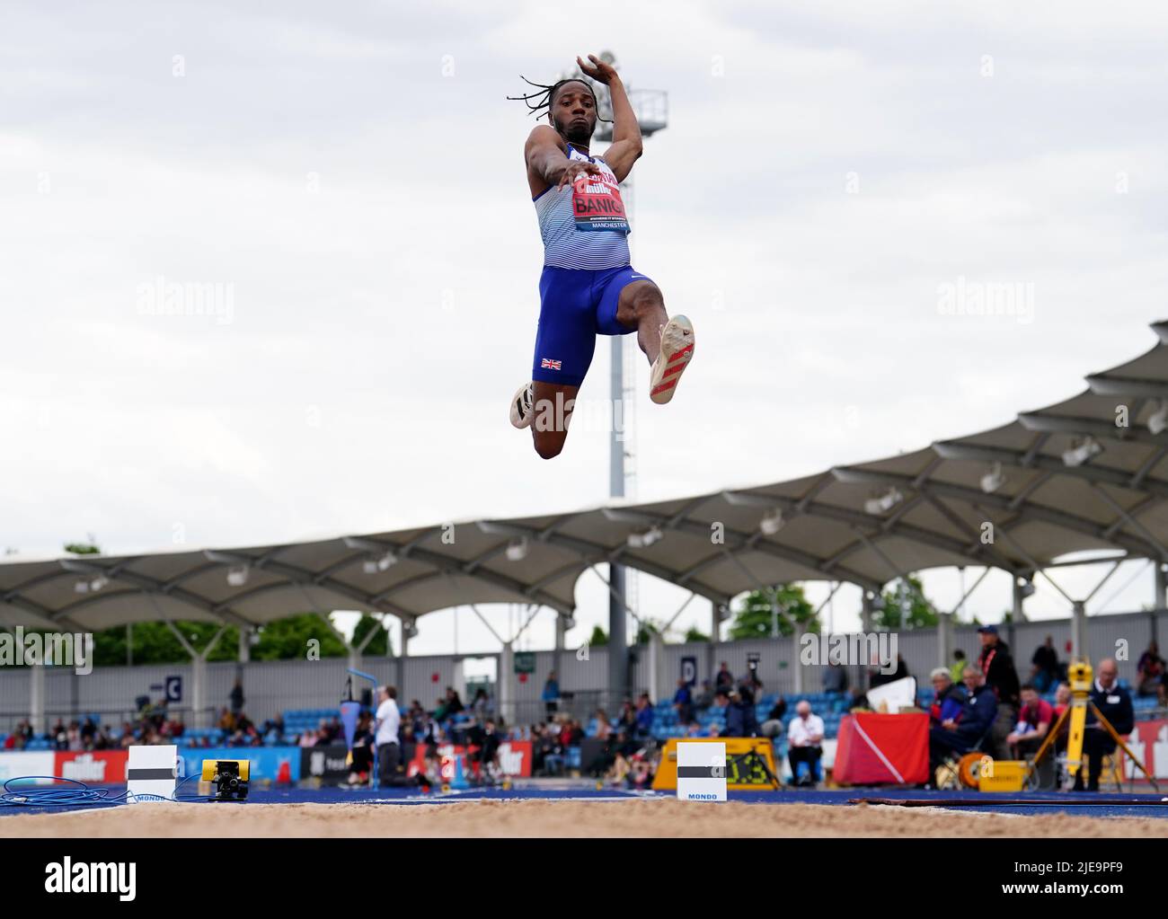 Reynold Banigo on his way to winning The MenÕs Long Jump during day ...