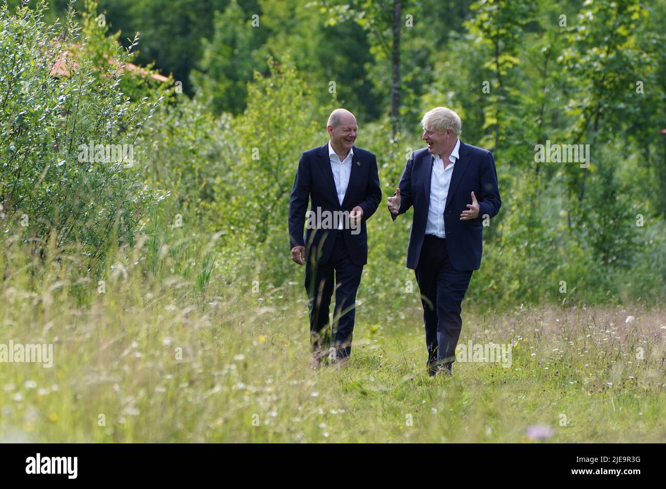 Prime Minister Boris Johnson with German Chancellor Olaf Scholz walking ...