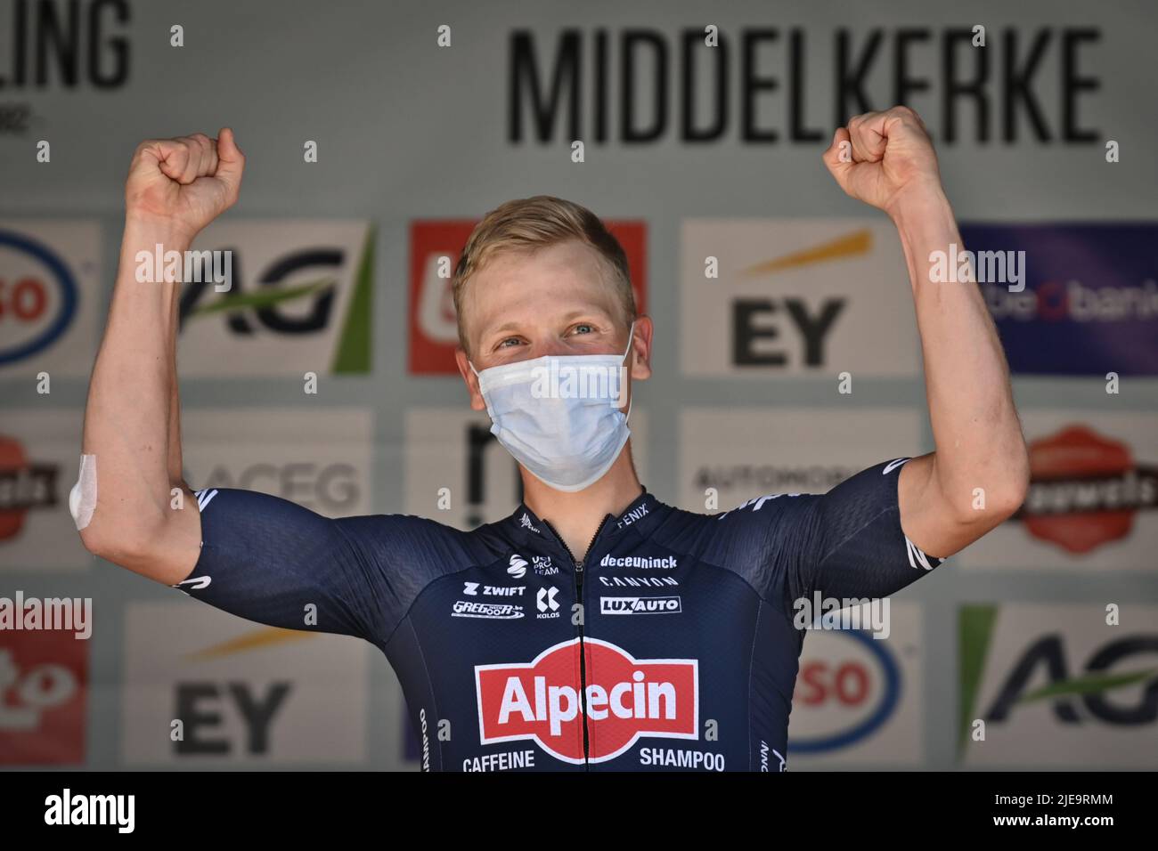 Belgian Tim Merlier of Alpecin-Fenix celebrates on the podium after ...