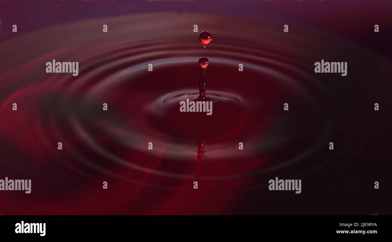 Water Drop Photography: red water drops with spire Stock Photo - Alamy