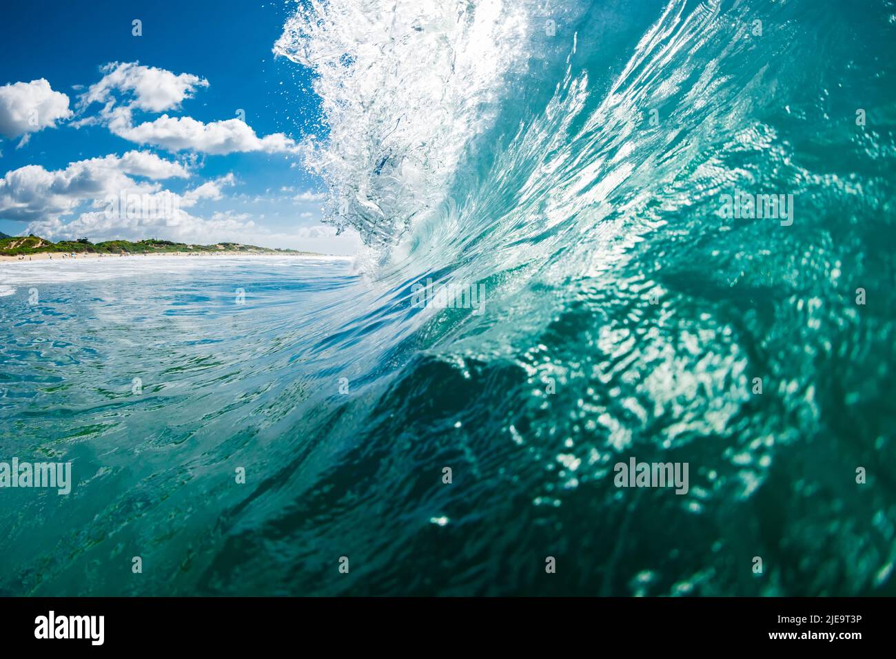 Beach break pipe waves in ocean. Breaking barrel wave with sunshine Stock Photo - Alamy