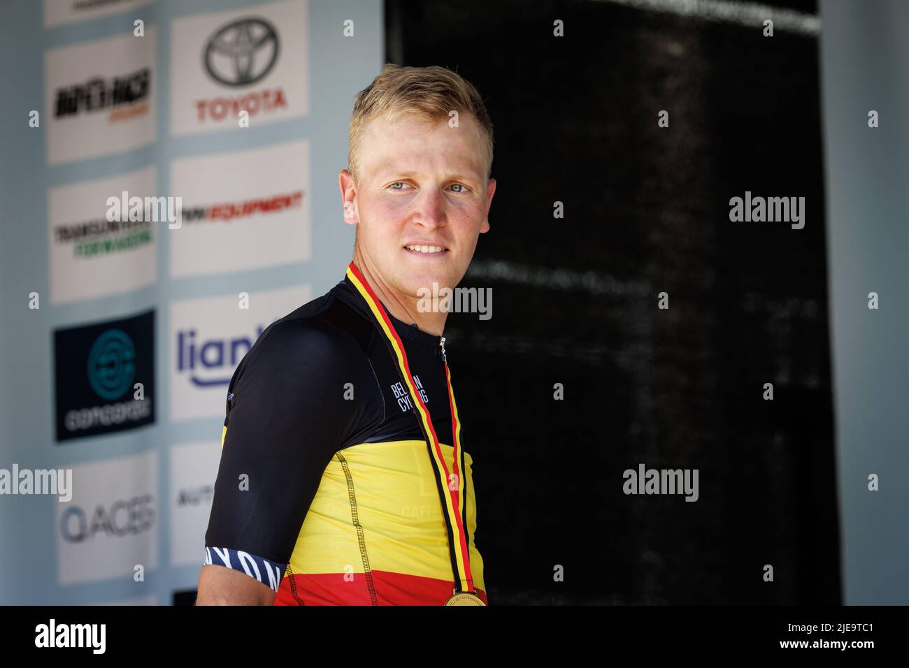 Belgian Tim Merlier of Alpecin-Fenix celebrates on the podium after ...