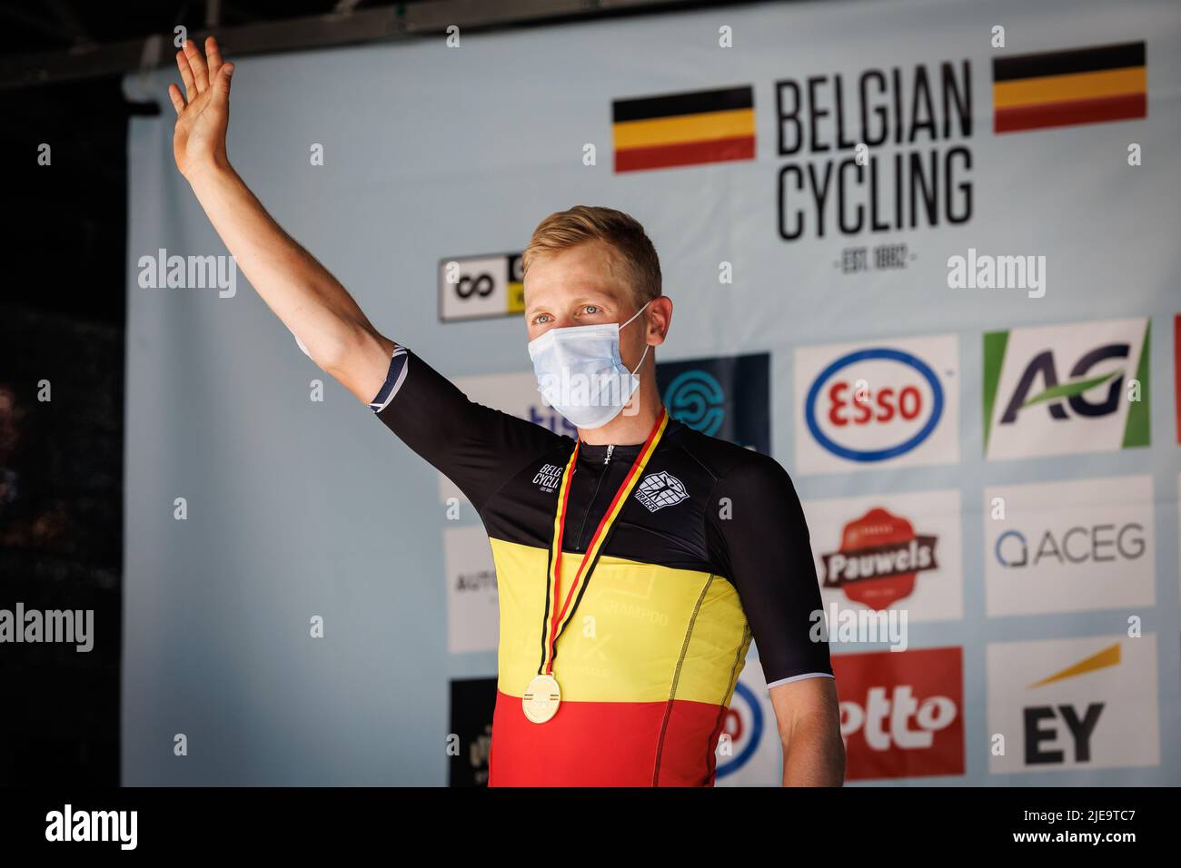 Belgian Tim Merlier of Alpecin-Fenix celebrates on the podium after ...