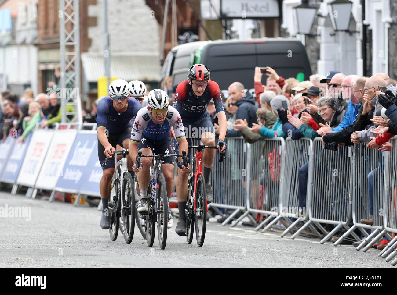 Mark Cavendish (right) leads the Men's Elite race as the peloton passes ...
