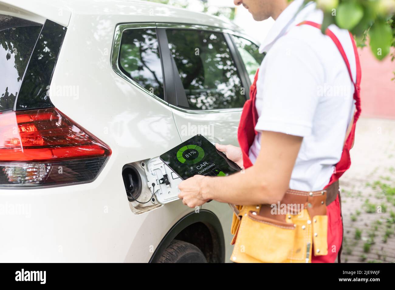 Close-up Of A Car Mechanic Using Digital Tablet Stock Photo - Alamy