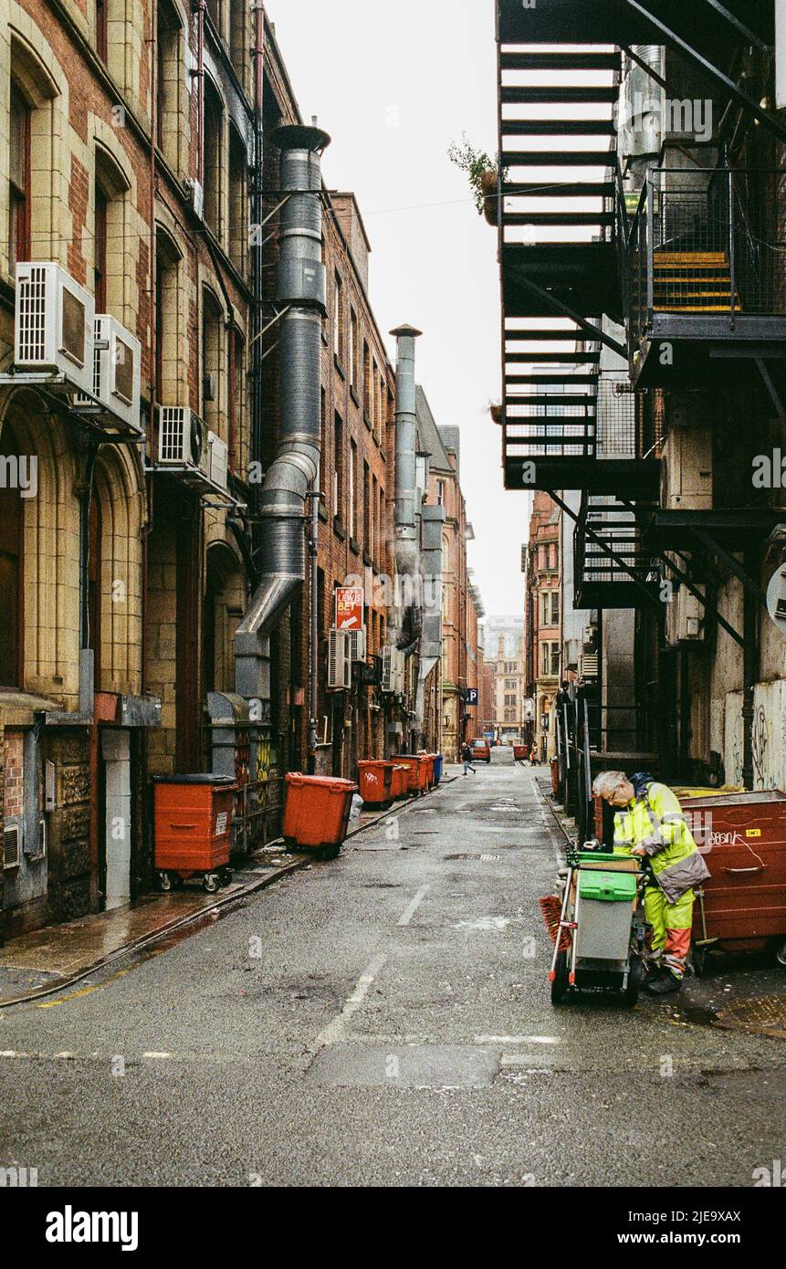 dustbinman and fire escape Stock Photo - Alamy