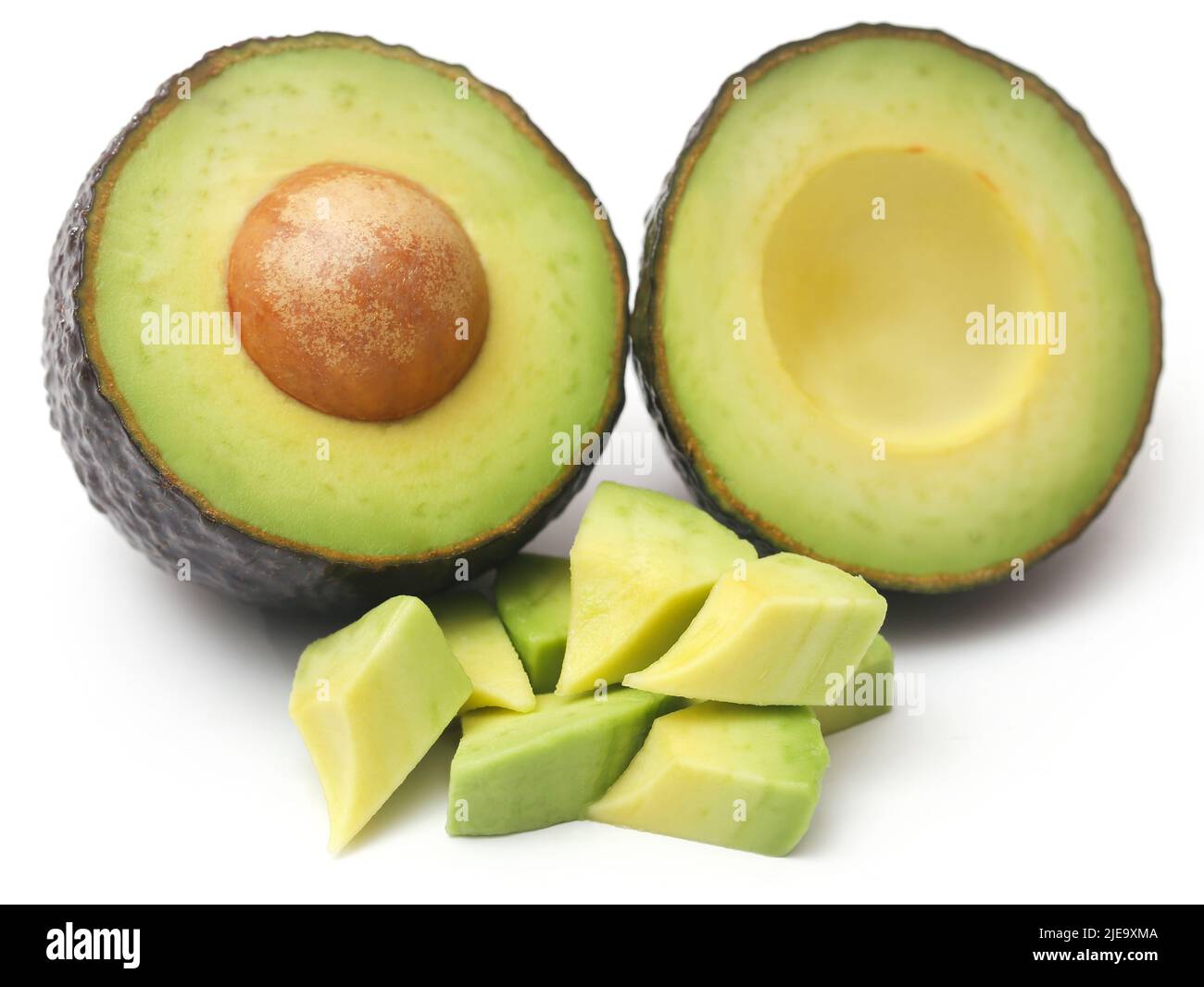 Fresh avocado with pieces over white background Stock Photo - Alamy
