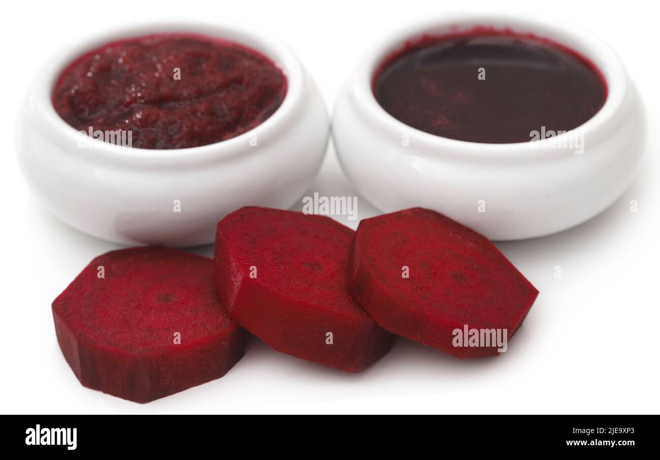 Beetroot and paste in a bowl over white background Stock Photo - Alamy