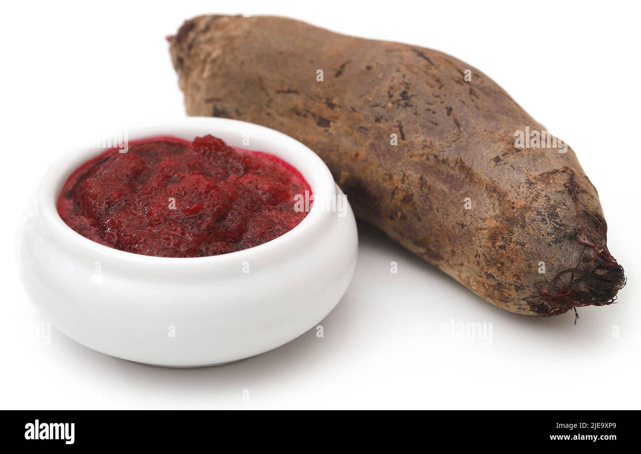 Beetroot and paste in a bowl over white background Stock Photo - Alamy