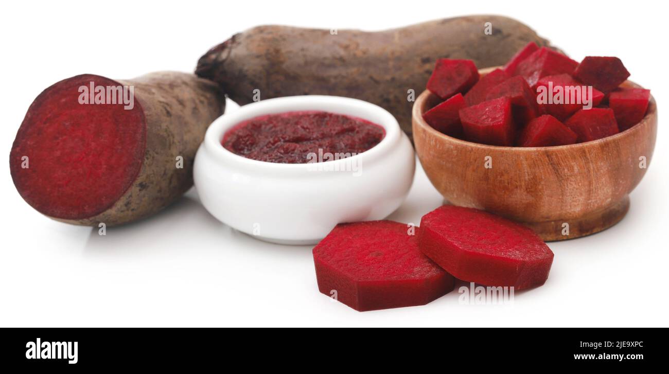 Beetroot and paste in a bowl over white background Stock Photo - Alamy
