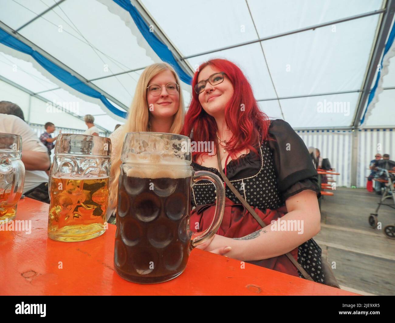 Garham, Germany. 25th June, 2022. Women in traditional Bavarian clothes ...