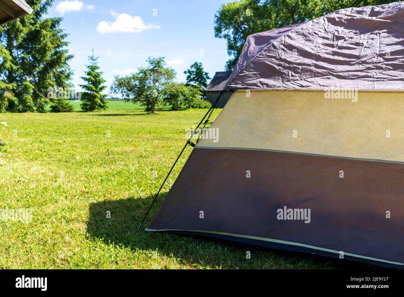 camping in the garden with green grass Stock Photo - Alamy