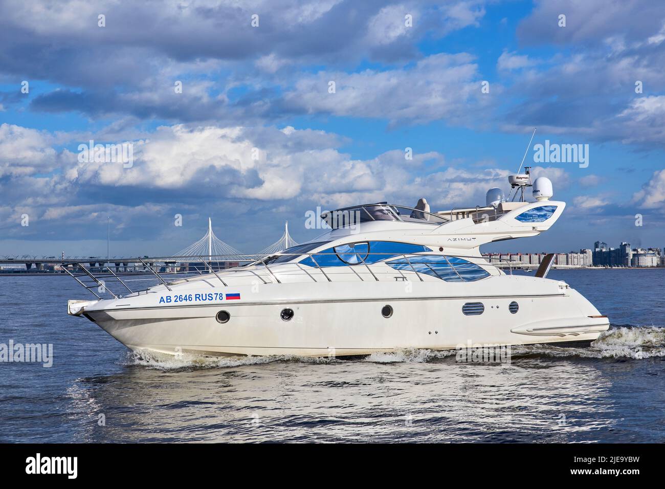 Photo of a yacht sailing in the bay Stock Photo - Alamy