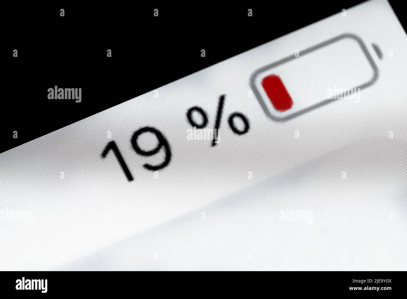 Smartphone battery level indicator - nineteen, 19 percent: close up ...