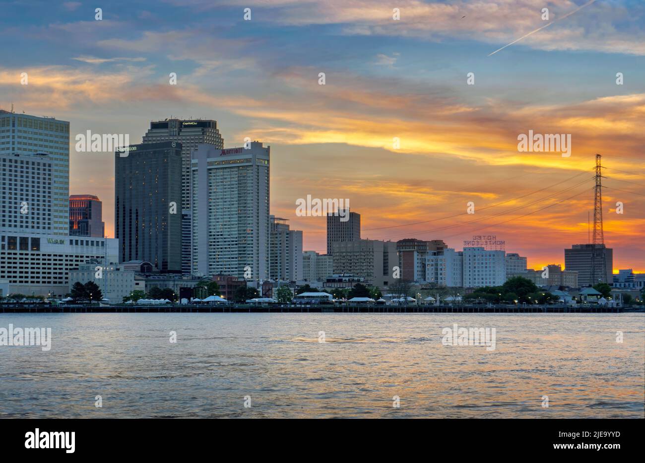 New Orleans Skyline at dusk- sunset view from Algiers Ferry Stock Photo ...