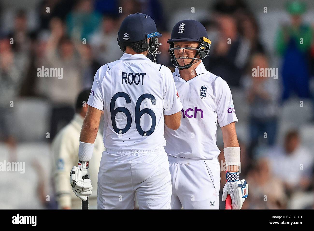 Joe Root of England and Ollie Pope of England celebrate a 100 ...
