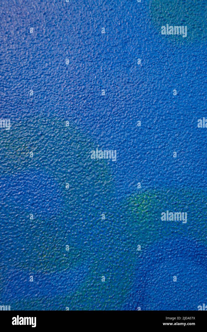 Fragment of stucco plaster wall with graffiti painting. Part of ...