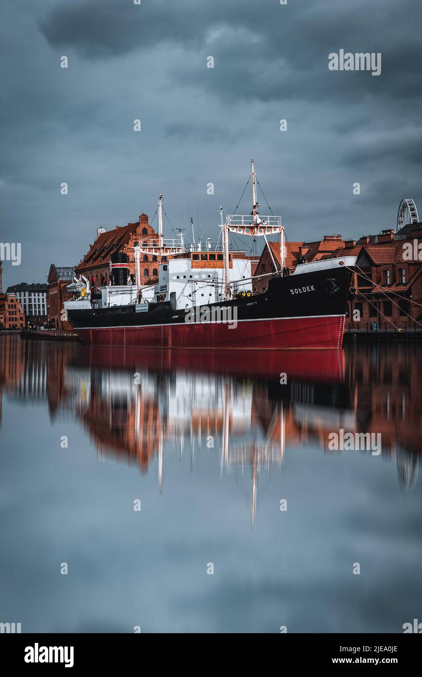 Reflections of the National Maritime Museum caught in the elblag canal ...