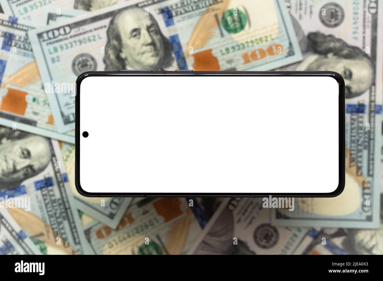 white smartphone screen on US dollar banknotes background for design ...
