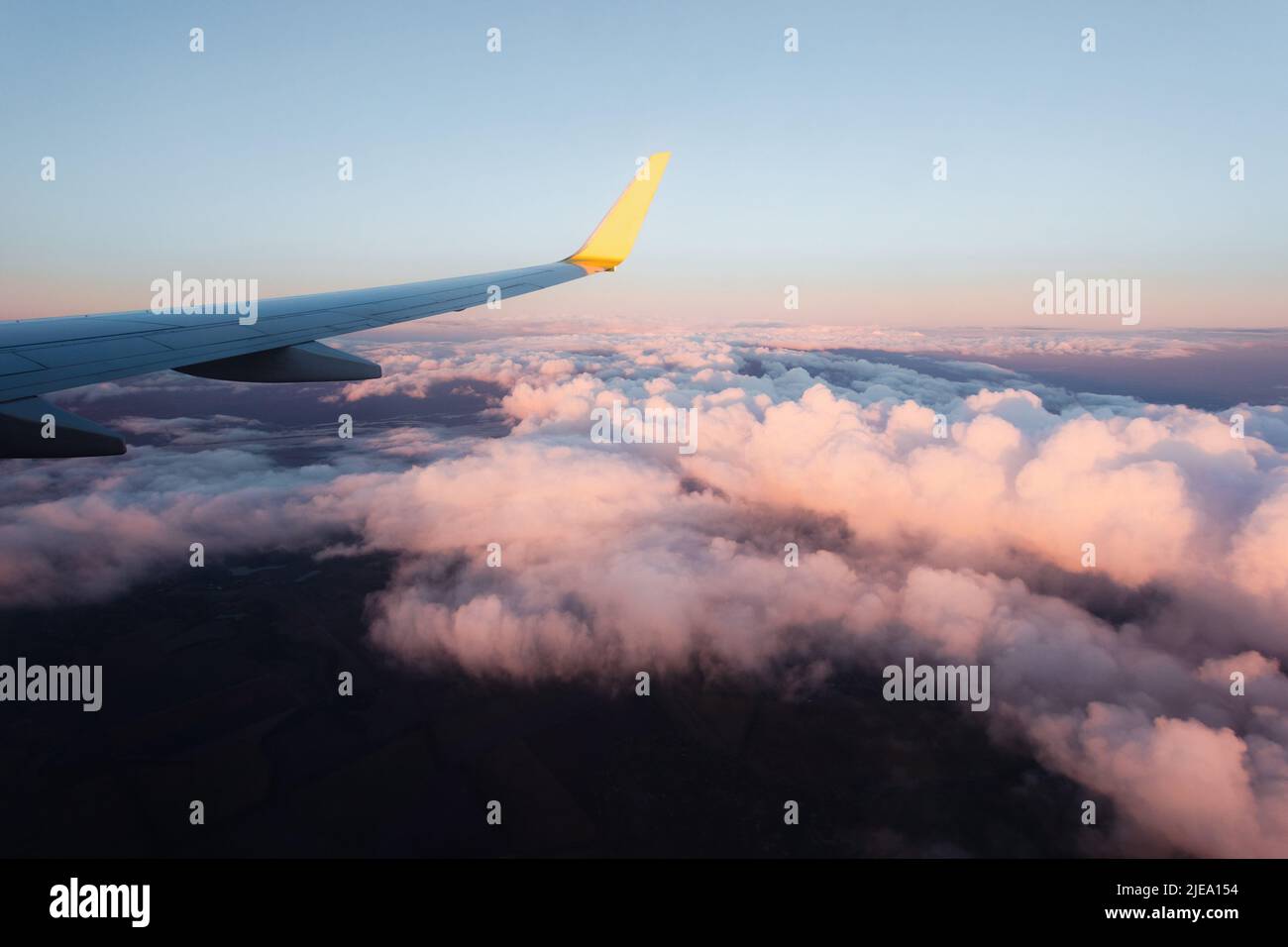 Stunning sunset from the window of the aircraft during the flight Stock ...