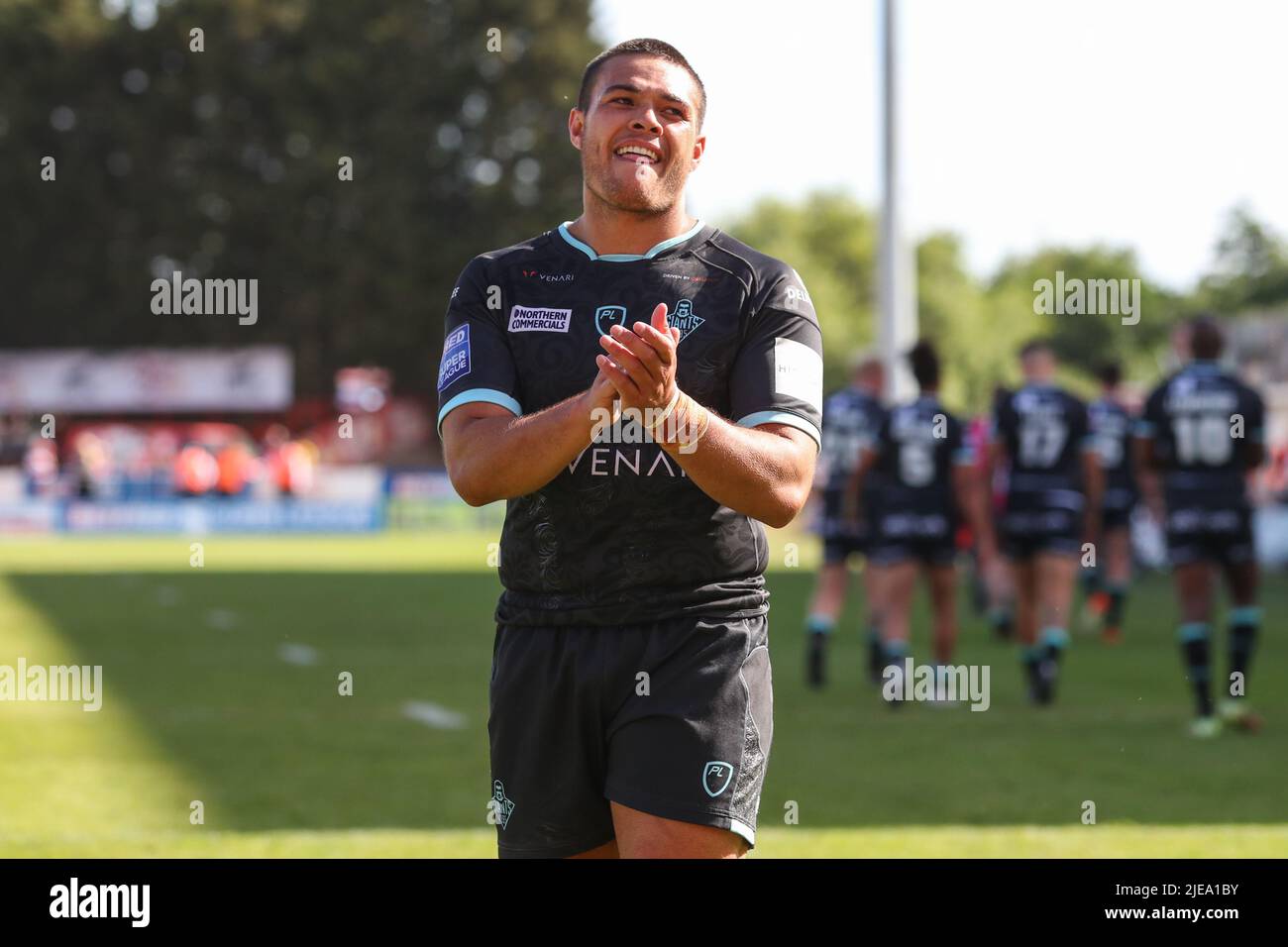 Tui Lolohea #6 of Huddersfield Giants applauds the travelling fans ...