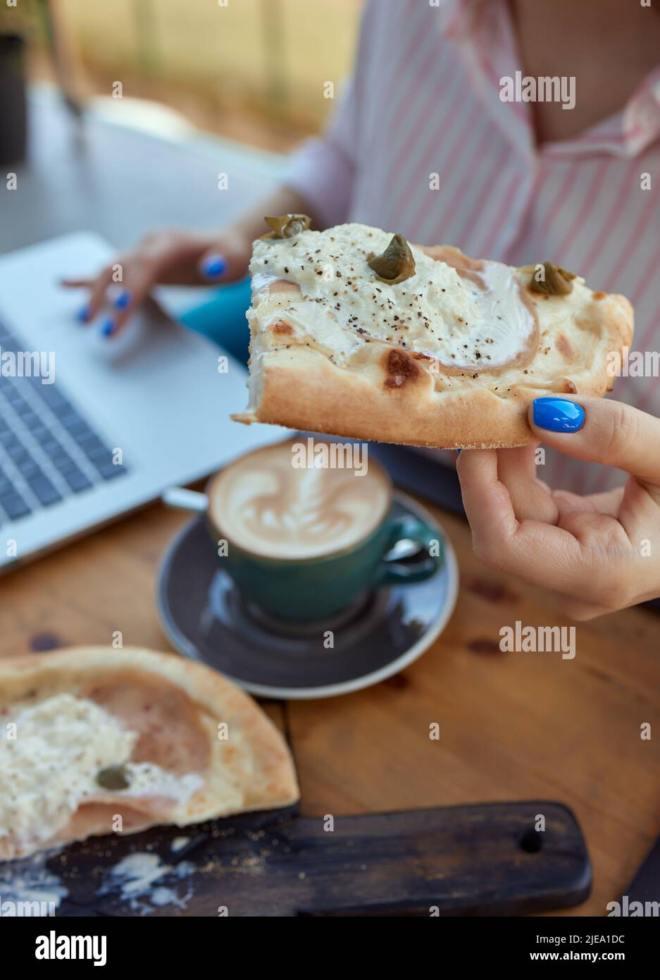 Very cheesy pizza of six kinds of cheese and pistachios. Italian food ...