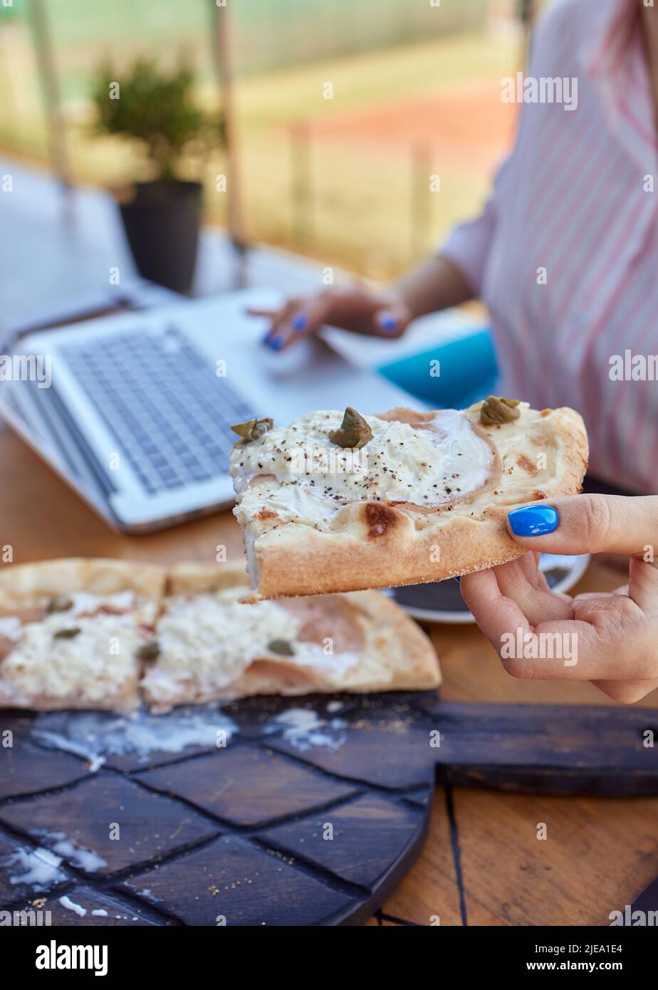 Very cheesy pizza of six kinds of cheese and pistachios. Italian food ...